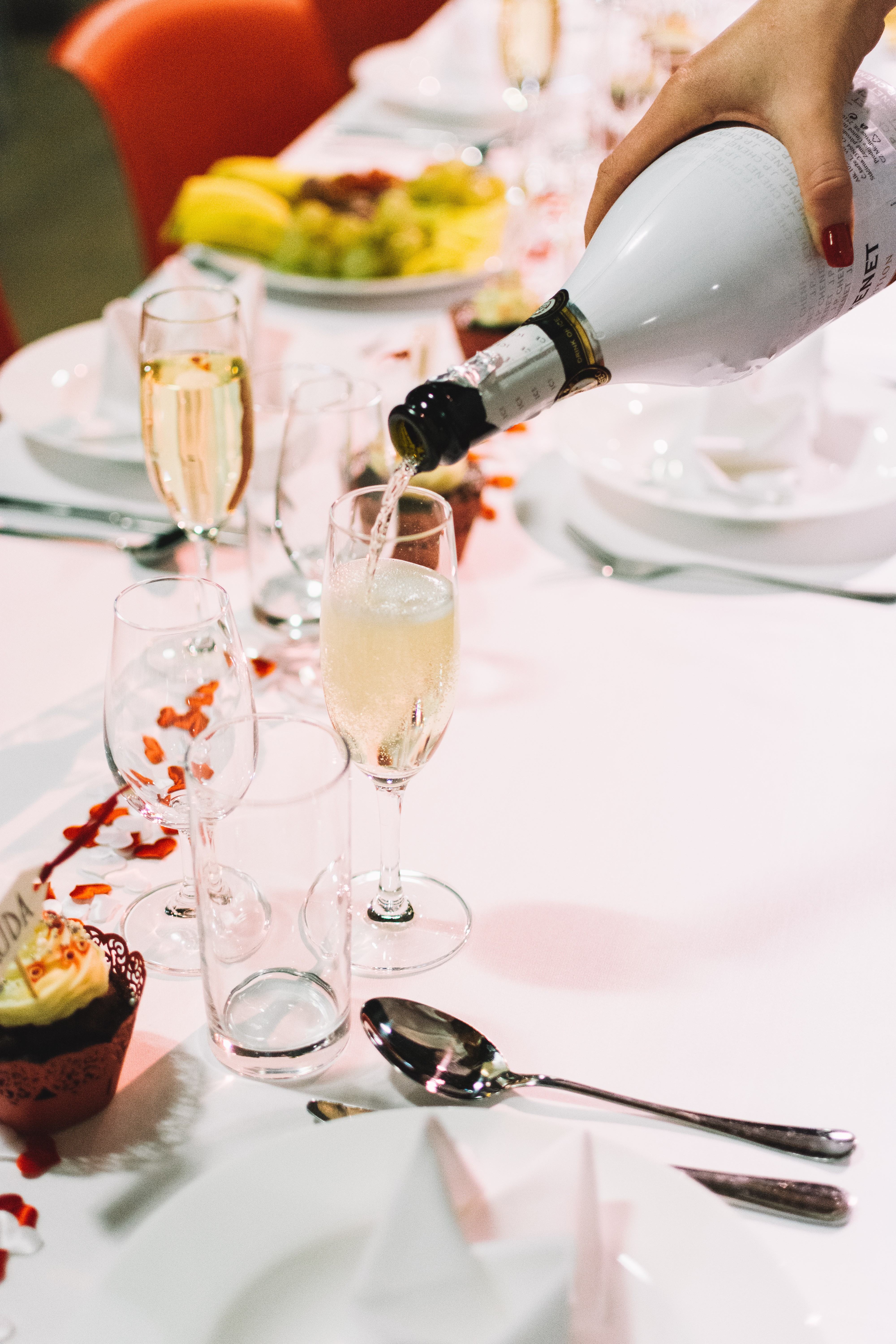 Pouring a toast of champagne on a wedding celebration party ...